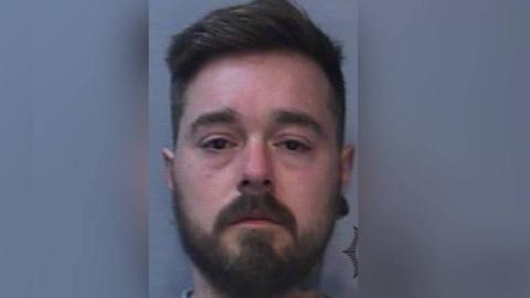 Daniel White strangled and slit wife's throat in their home - BBC News