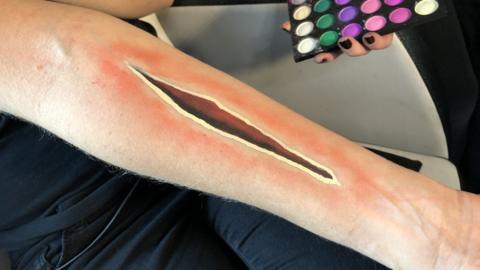Halloween: How to do a simple face paint wound - BBC Newsround