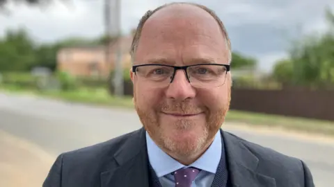 What does the scrapping of a wind farm plan mean for UK renewable energy?