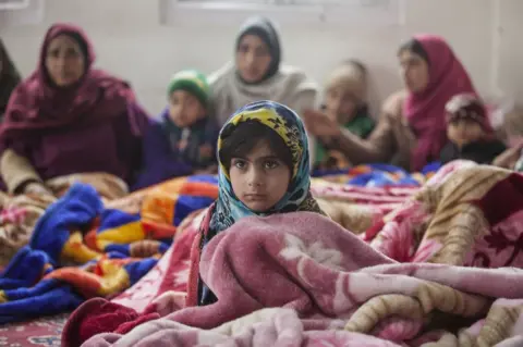 The Kashmir villagers fleeing bullets from two nations