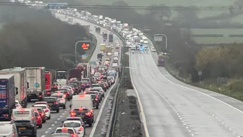 Child dies after M4 crash between car and lorry