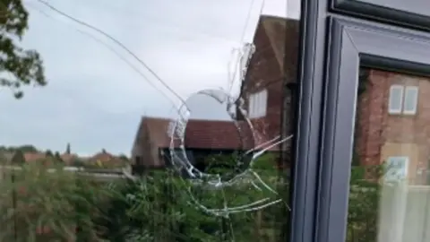 Norton: Mum hands teenage son to police over window smash