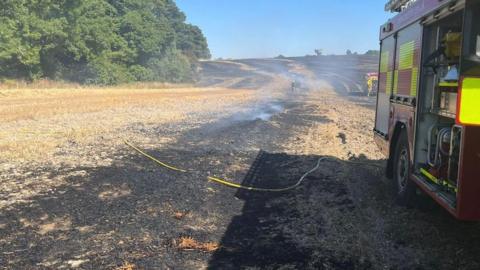 Biggleswade huge haystack fire tackled by crews - BBC News