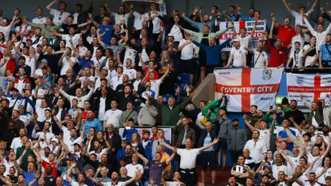 England fans show off their West Midlands flags in Euros win