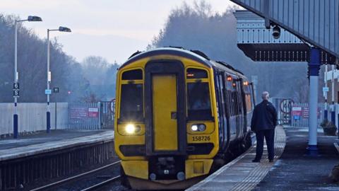 Festive disruption as strikes cripple rail network - BBC News