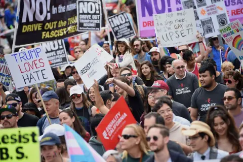 Thousands march in US for LGBT rights under Trump