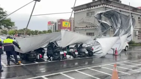 Typhoon Haikui: Dozens injured after storm sweeps Taiwan
