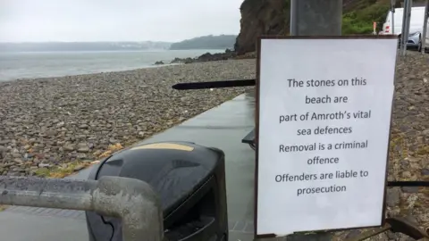 Amroth beach stone removal 'down' since warning signs erected
