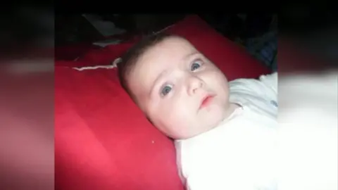 Heartbroken Grimsby mum told to remove memorial from son's grave