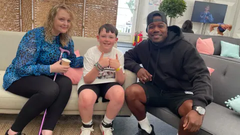 Rudimental's Locksmith meets 10-year-old carer at festival