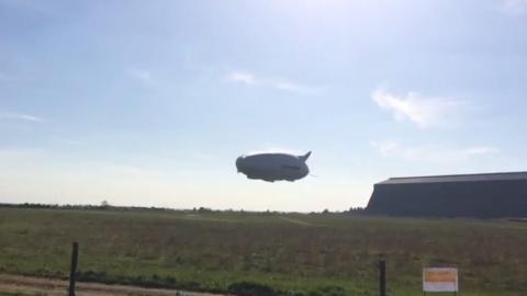 Airlander 10 takes to skies for first time since crash - BBC News