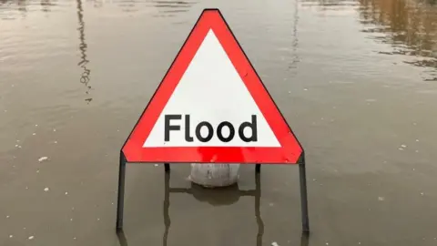 Flood warnings: Sussex residents told to act now and move families