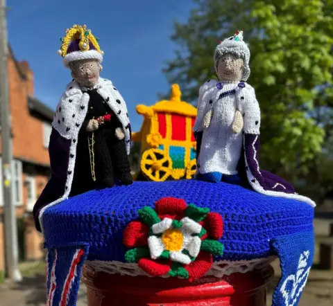 King Charles III beheaded three times in village's knitted displays
