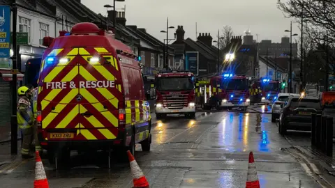 Luton takeaway fire causes road closure