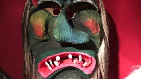 Masks come out in Swiss 'valley of monsters' - BBC News