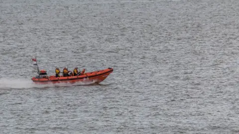 Clacton lifeboat rescues capsized sea kayakers