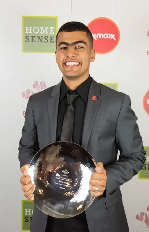 Prince's Trust: Young refugee meets King after winning award