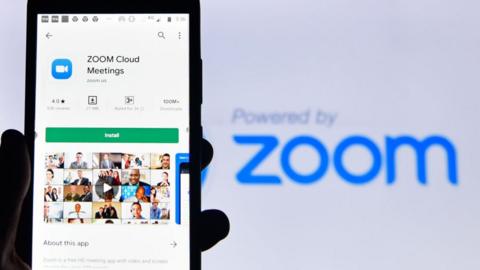 Microsoft and Zoom join Hong Kong data 'pause' - BBC News