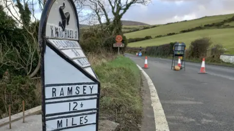 Historic Isle of Man TT course milestone repaired after crash
