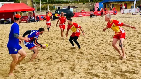 Poole touch rugby team's 34-hour beach match confirmed as record