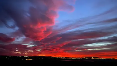 In pictures: Clouds create perfect conditions for stunning sunset