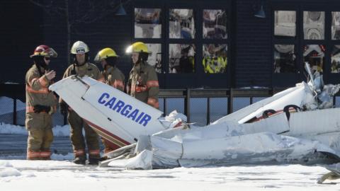 Canada mid-air plane collision over shopping centre kills one - BBC News