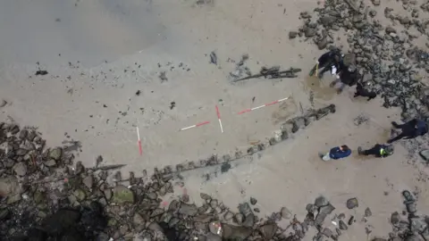 Storms uncover 200-year-old boat on Portrush beach