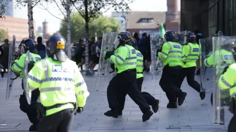 Liverpool teenager facing charges over riots got carried away - mum
