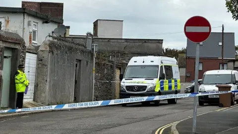 Man released over woman's fall from window in Plymouth