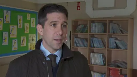 Ten NI schools close due to winter vomiting bug