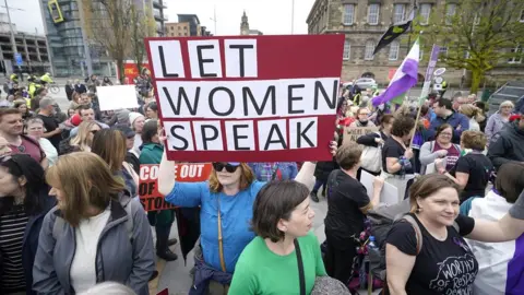 Transgender-related protesters divided by police in Belfast