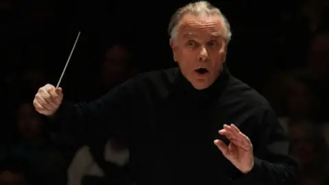 Halle conductor Sir Mark Elder hangs up his baton after 24 years