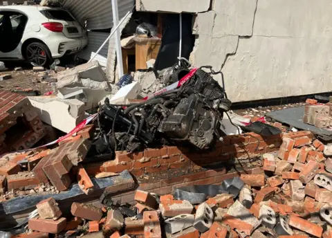 Man and teenager injured in Littleover garage crash