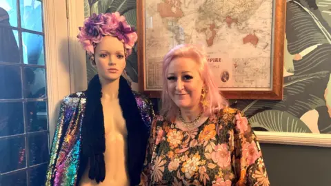 Edinburgh pink door woman sad after being forced to repaint