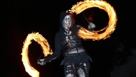 Fire festival lights up Edinburgh to celebrate start of winter