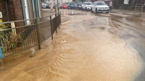 A64 Rillington diversions after water main burst closes road - BBC News
