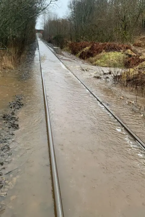 Flooding and landslides hit Scotland amid yellow warning for rain