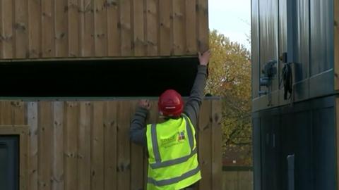 Construction begins on Reading prefab homeless housing - BBC News
