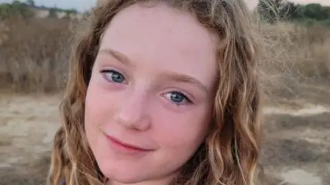 Emily Hand 'better than expected' after hostage ordeal