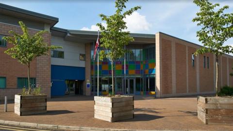 HMP Forest Bank prison officer held in corruption probe - BBC News