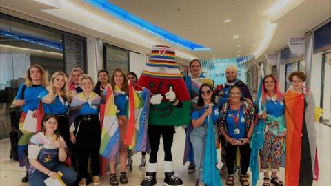 In Pictures: Pride Cymru turns streets of Cardiff rainbow - BBC News