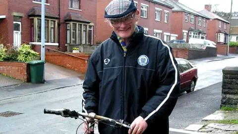 Rochdale football statue tribute to £250k legacy fan