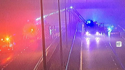 Crane hits two bridges on A63 causing road chaos