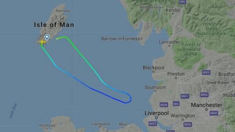 Cracked windscreen plane makes emergency return to Isle of Man - BBC News