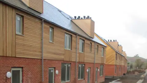 Bridport affordable housing scheme welcomes first residents