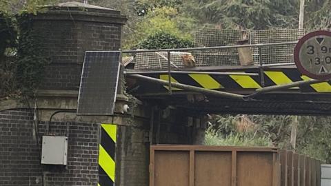 School bus gets stuck under low bridge again - BBC News
