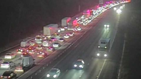 Woman died in M11 car and lorry crash near Harlow, police confirm - BBC News