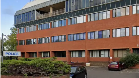 Reading police officer charged with threat and harassment