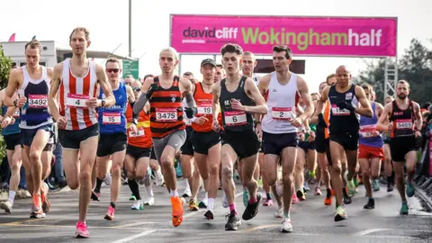 Runners pound pavements in Wokingham Half Marathon