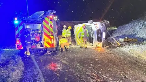Dorset flooding and snow: Firefighters free stranded drivers